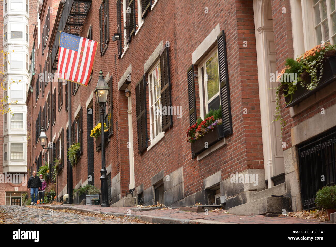 The iconic Acorn Street atop Beacon Hill in downtown Boston on an ...