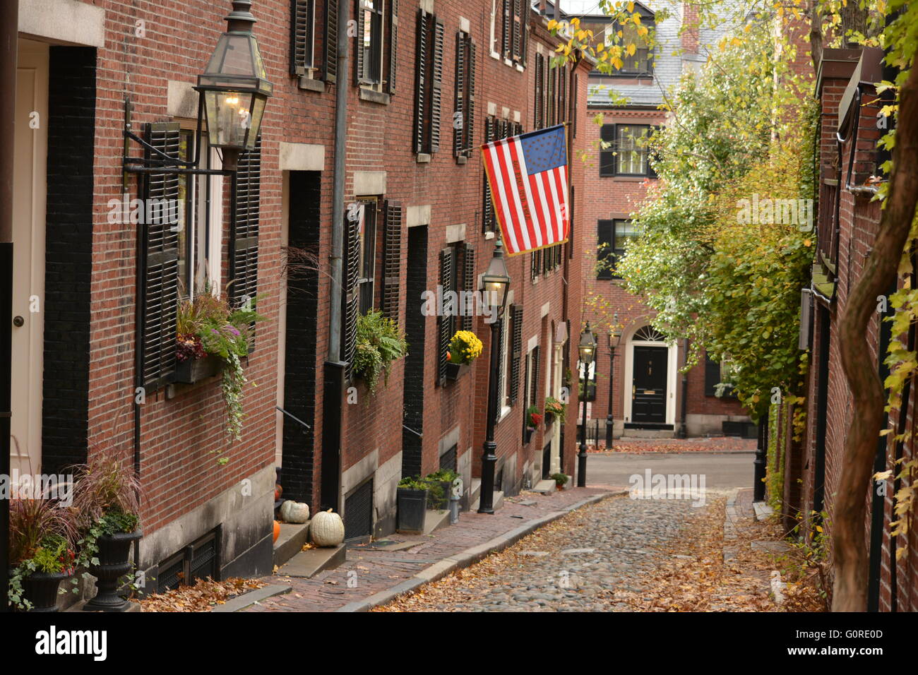 The iconic Acorn Street atop Beacon Hill in downtown Boston on an ...