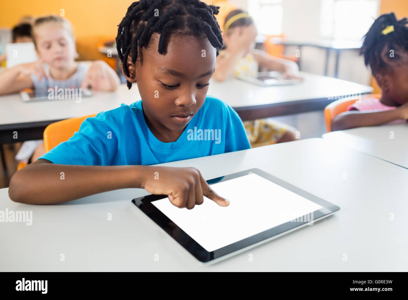 Male pupil tablet pc hi-res stock photography and images - Alamy