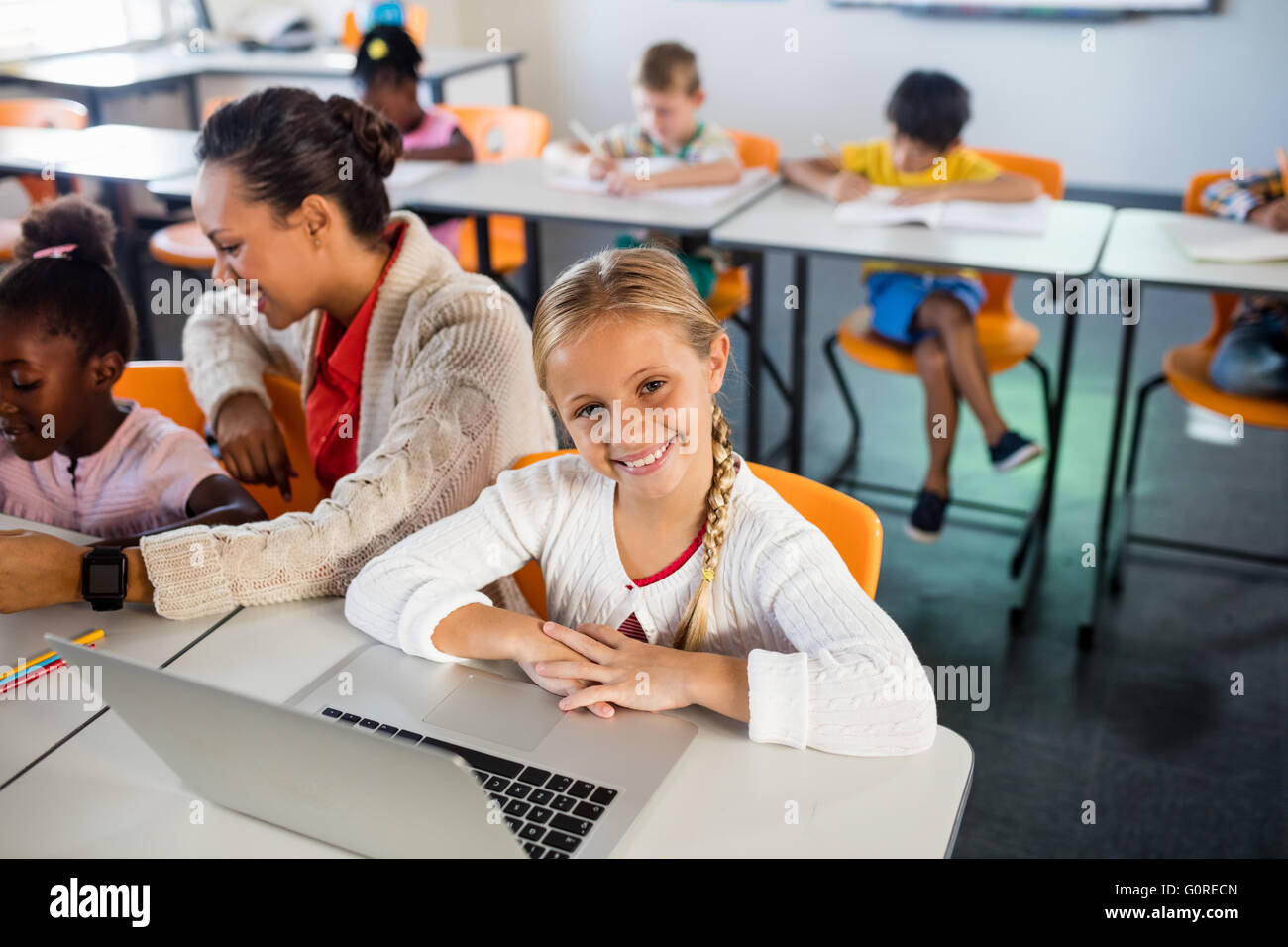 Student posing with her computer Stock Photo - Alamy