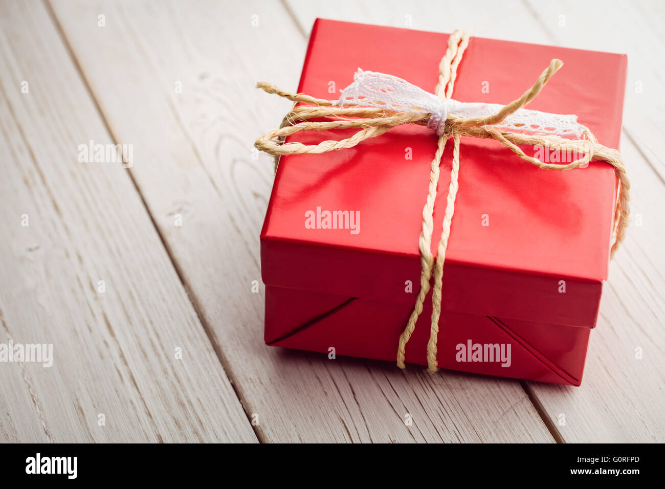 Overhead view of a red present Stock Photo - Alamy