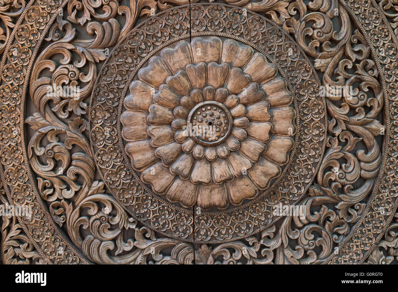 Pattern of flower carved on wood background Stock Photo - Alamy