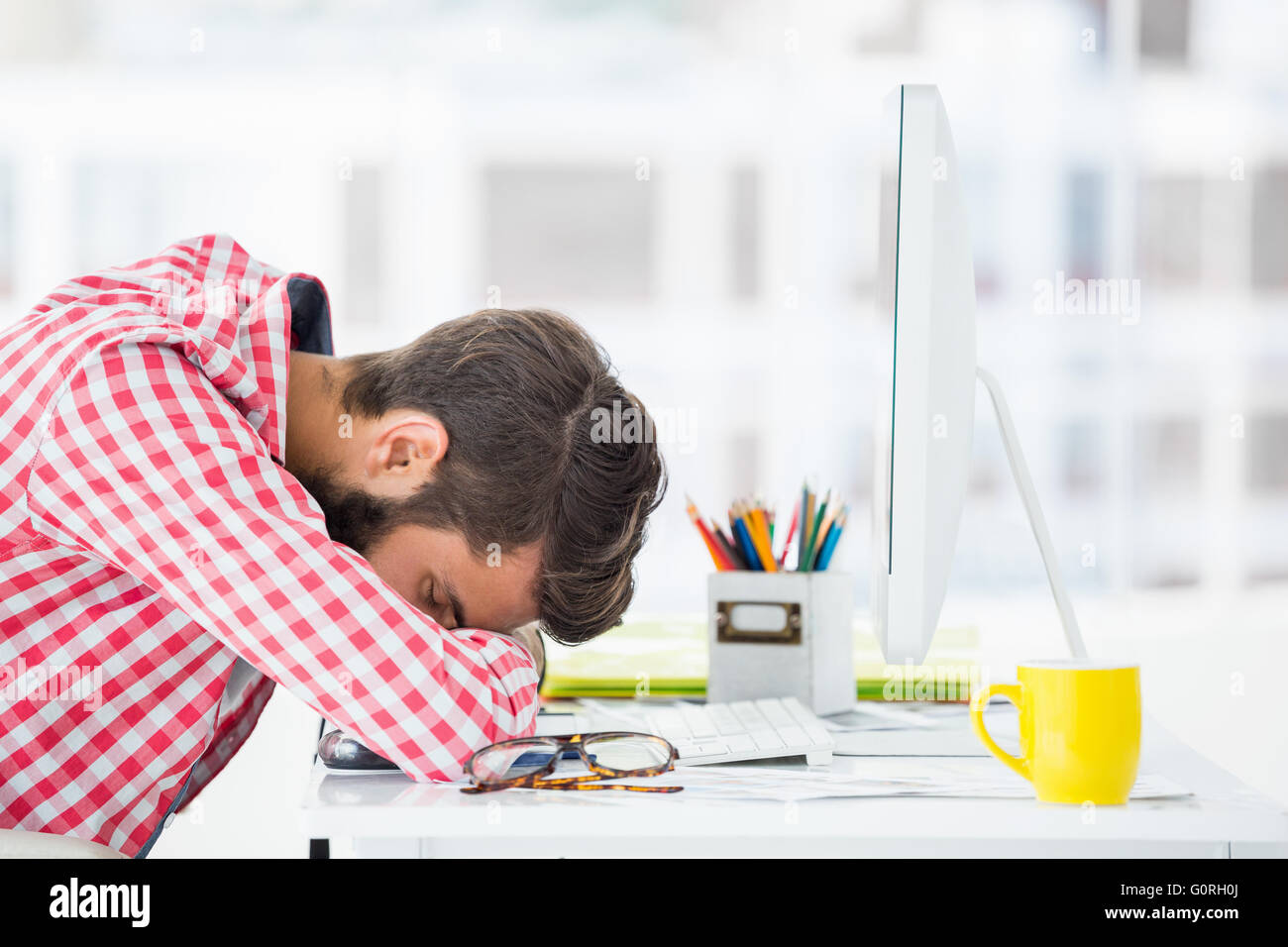 Tired and desk hi-res stock photography and images - Alamy