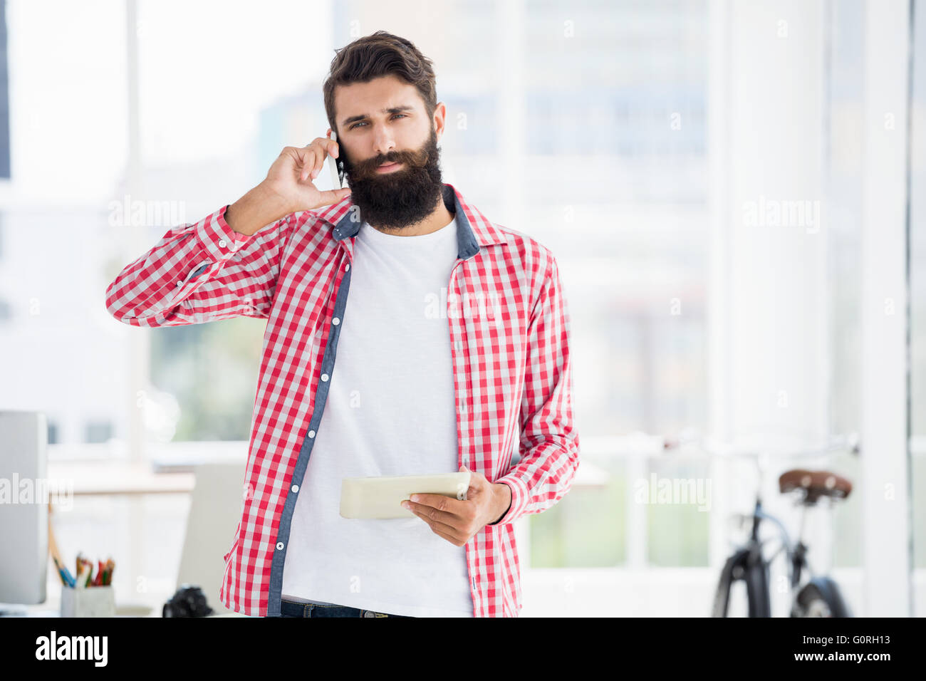 Stylish young man talking someone hi-res stock photography and images ...