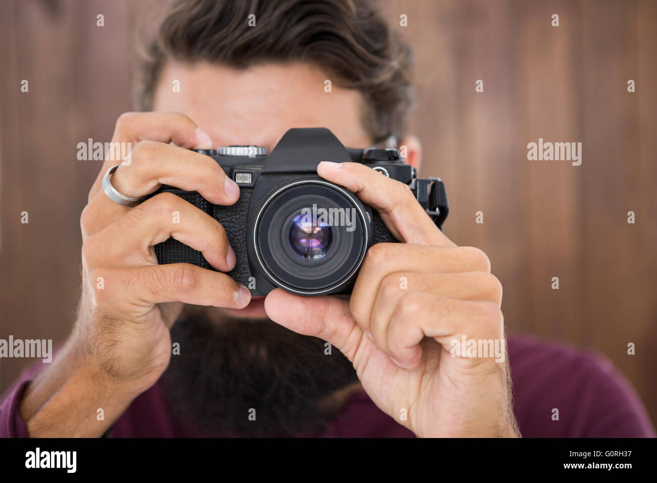 Hipster man taking picture Stock Photo - Alamy