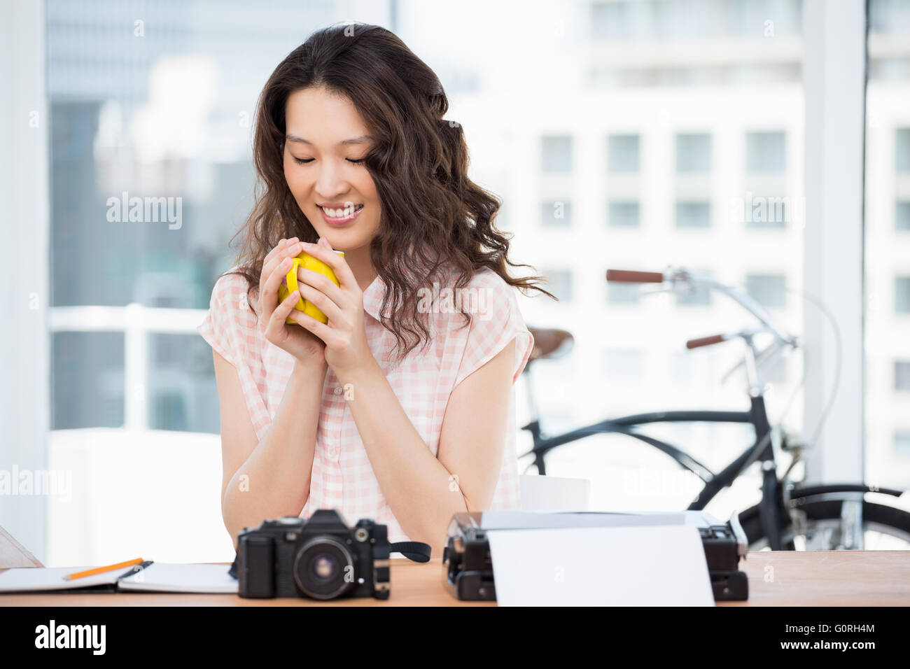 Hipster woman drinking a coffee Stock Photo - Alamy