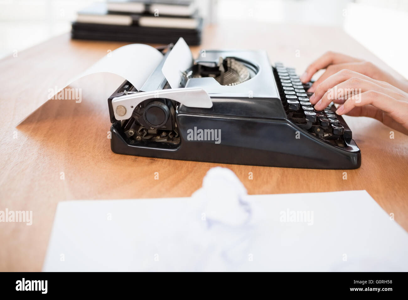 Hipster woman using a typewriter Stock Photo - Alamy