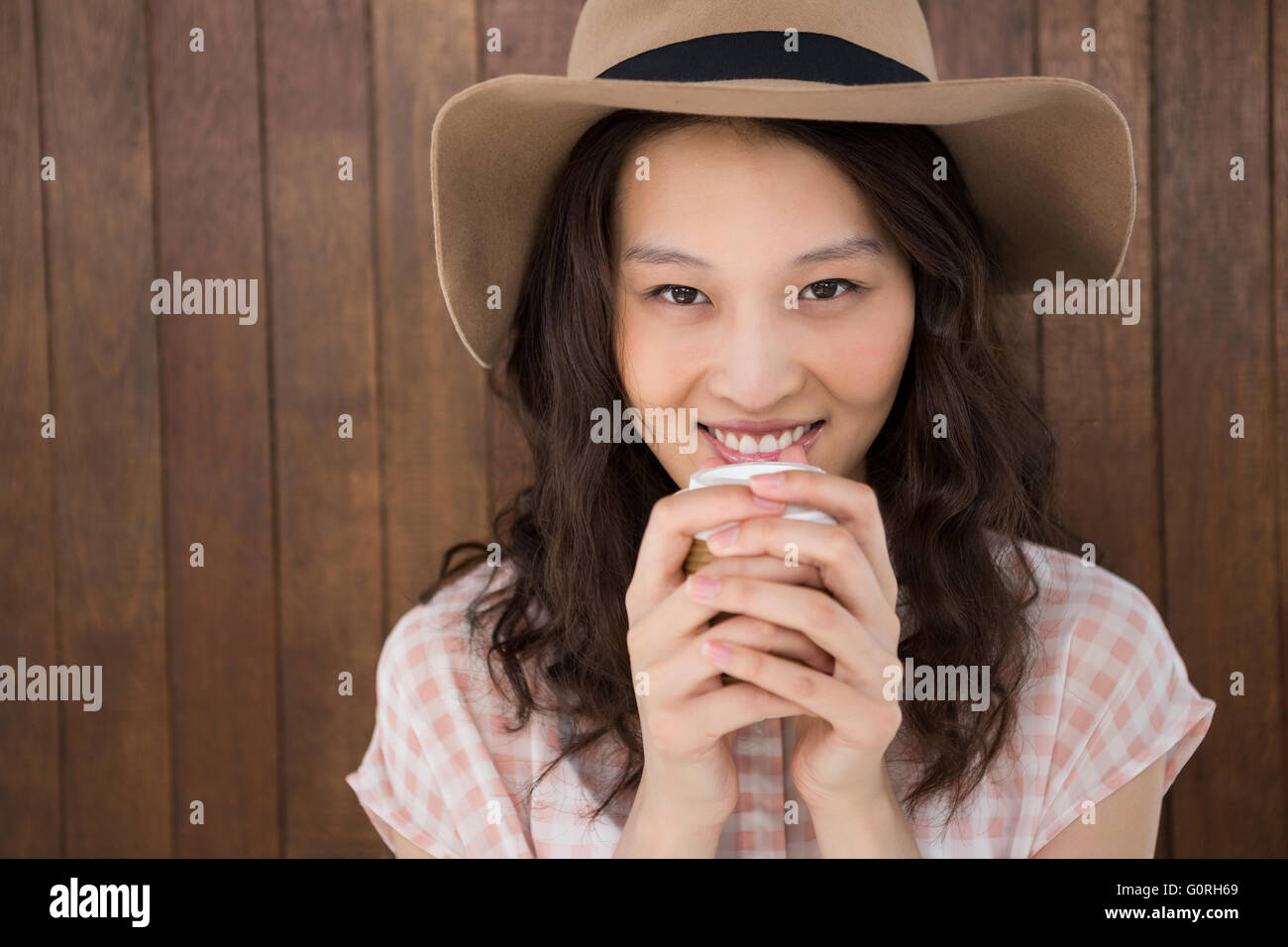 Hipster woman drinking a coffee Stock Photo - Alamy