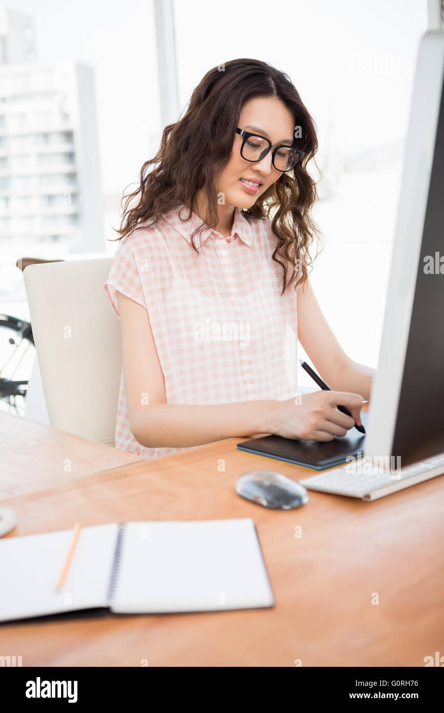 Hipster woman using a tablet Stock Photo - Alamy