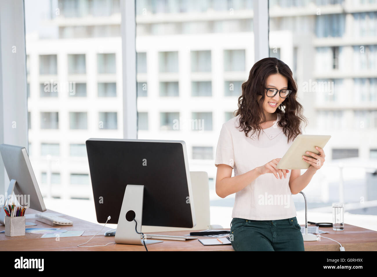 a business woman is using her pad Stock Photo - Alamy