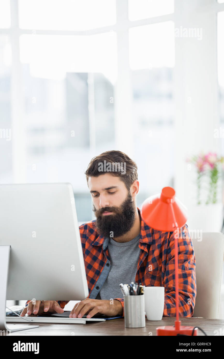 Attractive serious business man working hi-res stock photography and ...