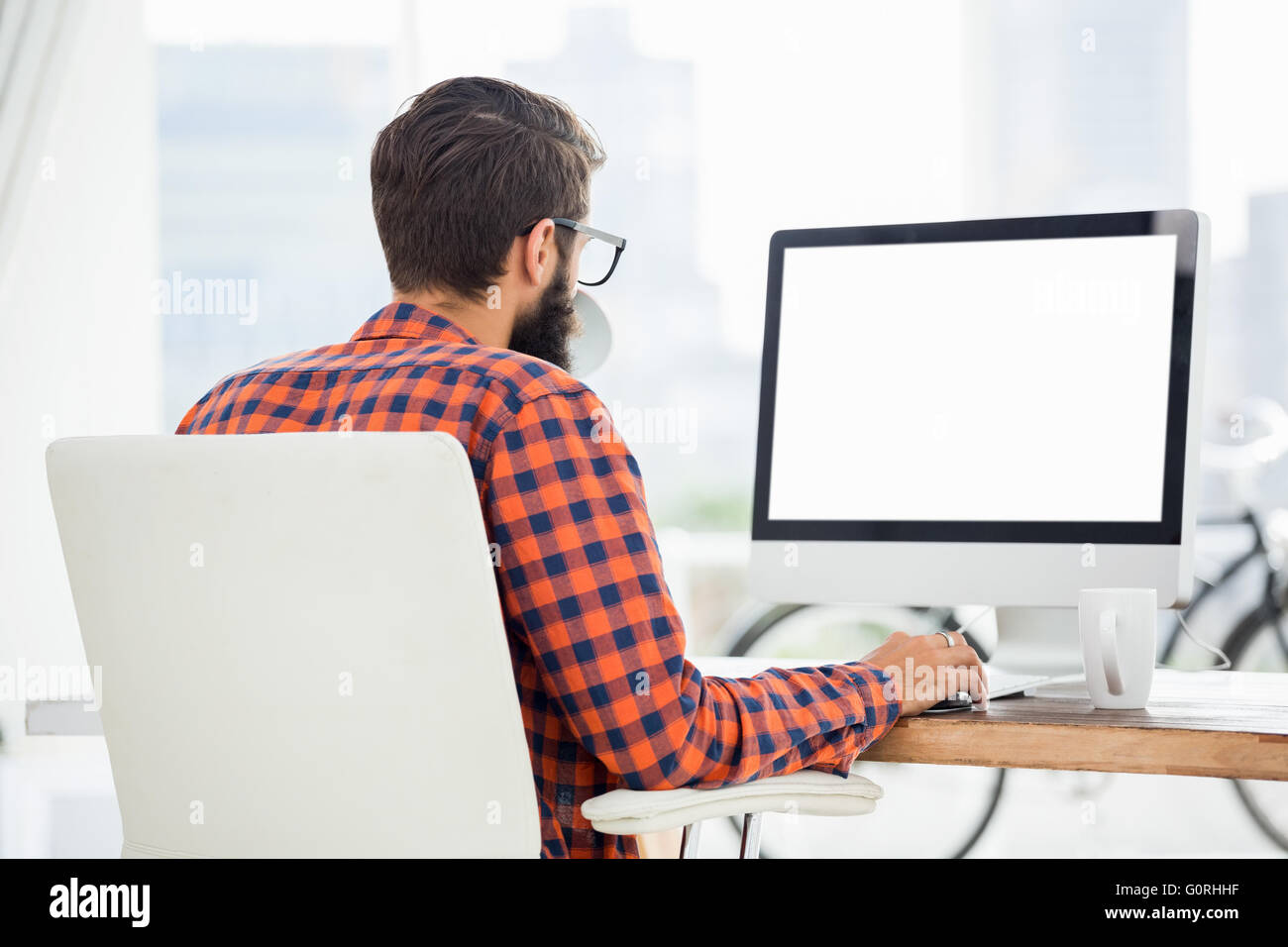 Hipster using a computer Stock Photo - Alamy