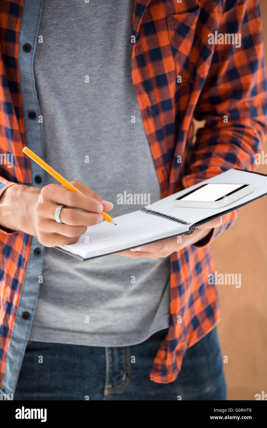 Hipster taking notes Stock Photo - Alamy