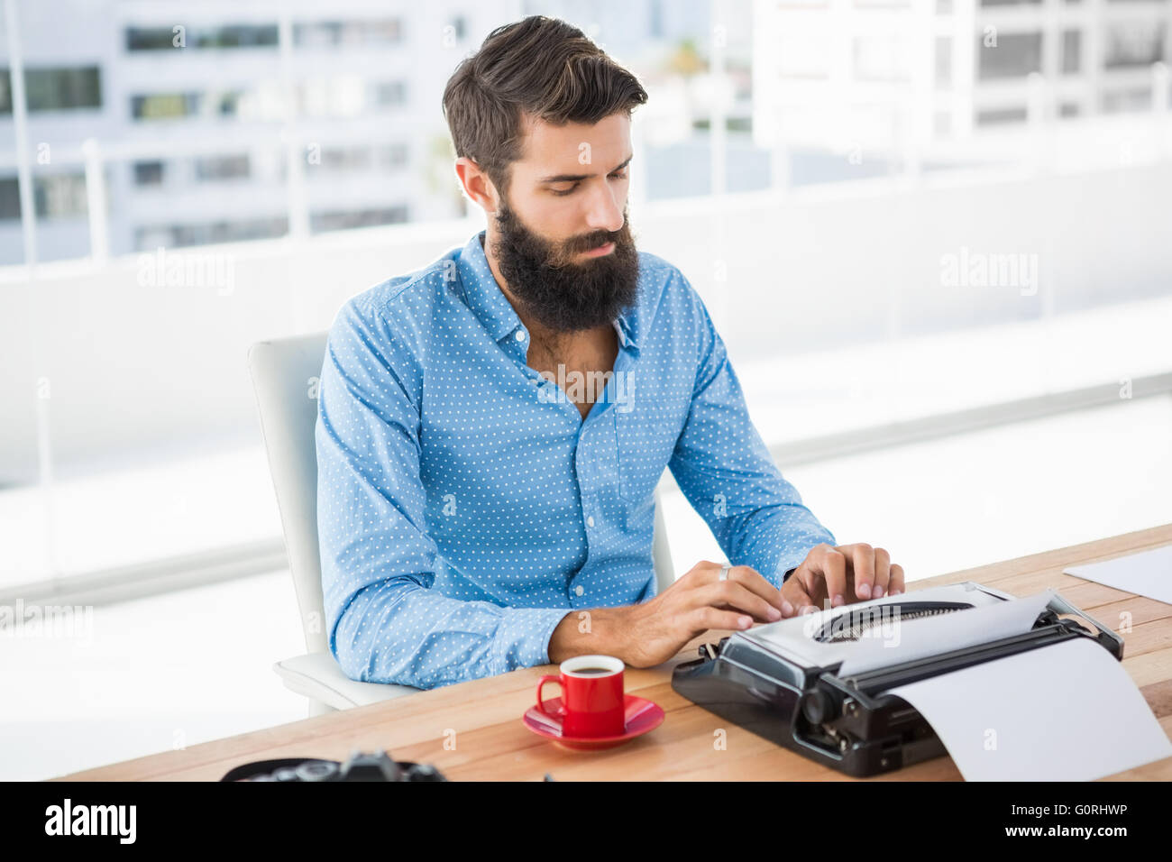 Male writer using typing machine hi-res stock photography and images ...