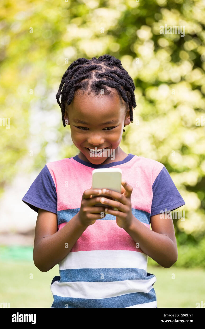 Boy using a smartphone Stock Photo - Alamy