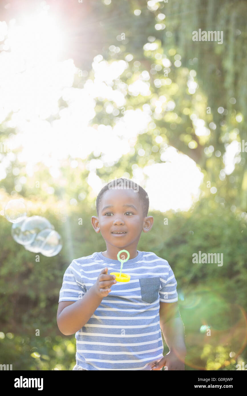 Portrait of child making bubble Stock Photo - Alamy