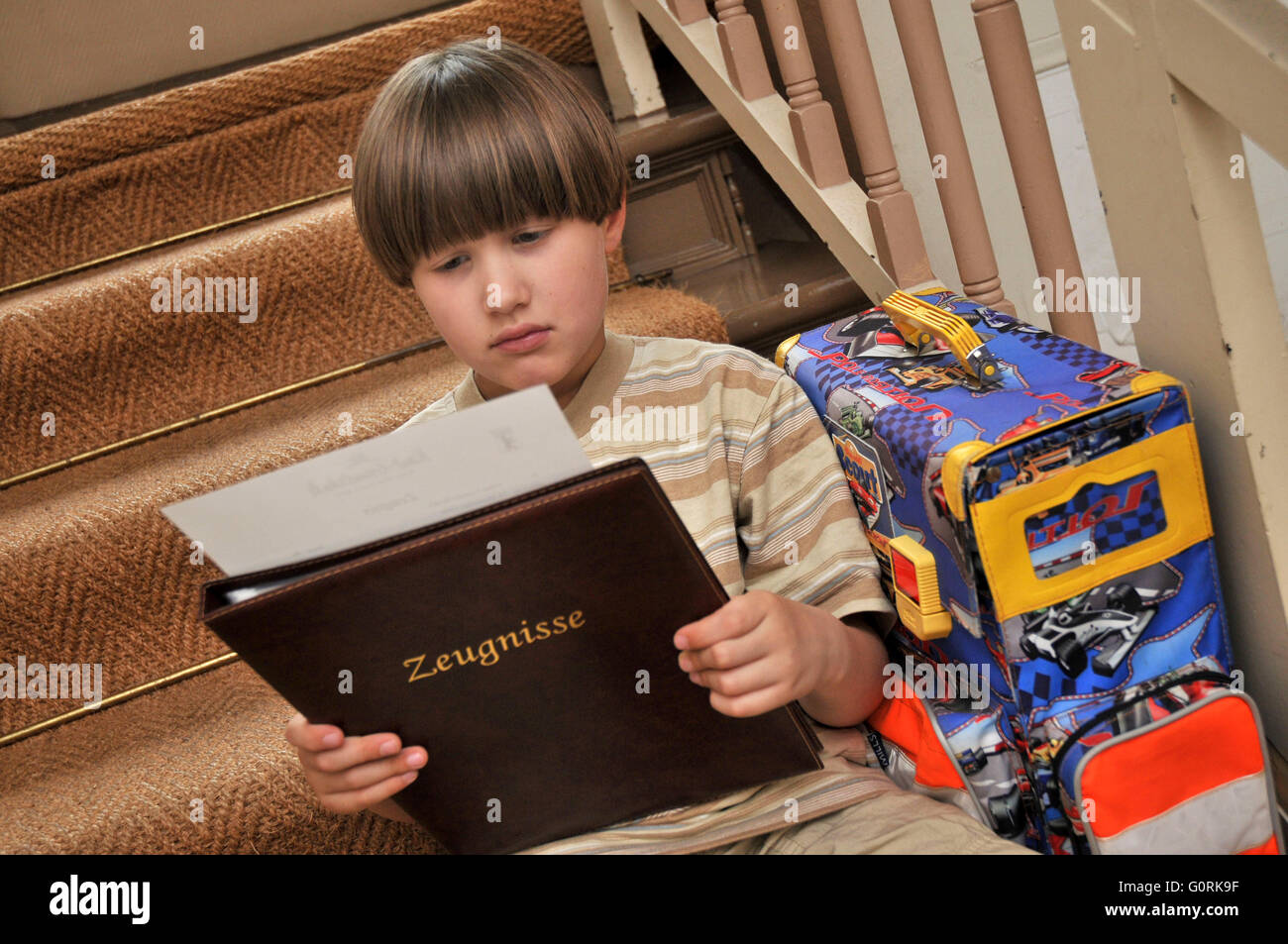 Schoolboy, schoolchild, pupil, bad report, mark, grade Stock Photo - Alamy