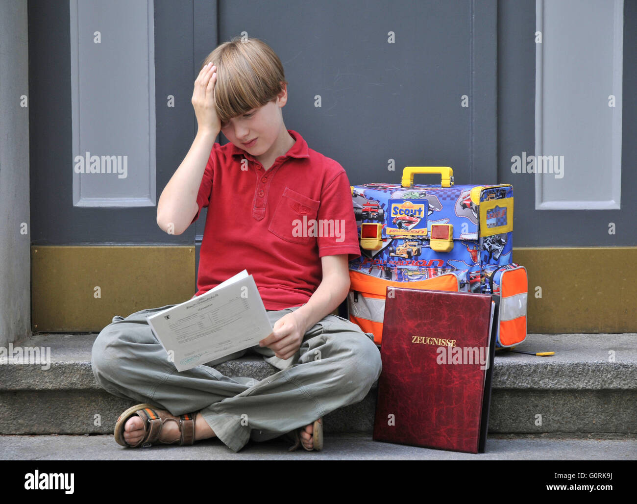 Schoolboy, schoolchild, pupil, bad report, mark, grade Stock Photo - Alamy