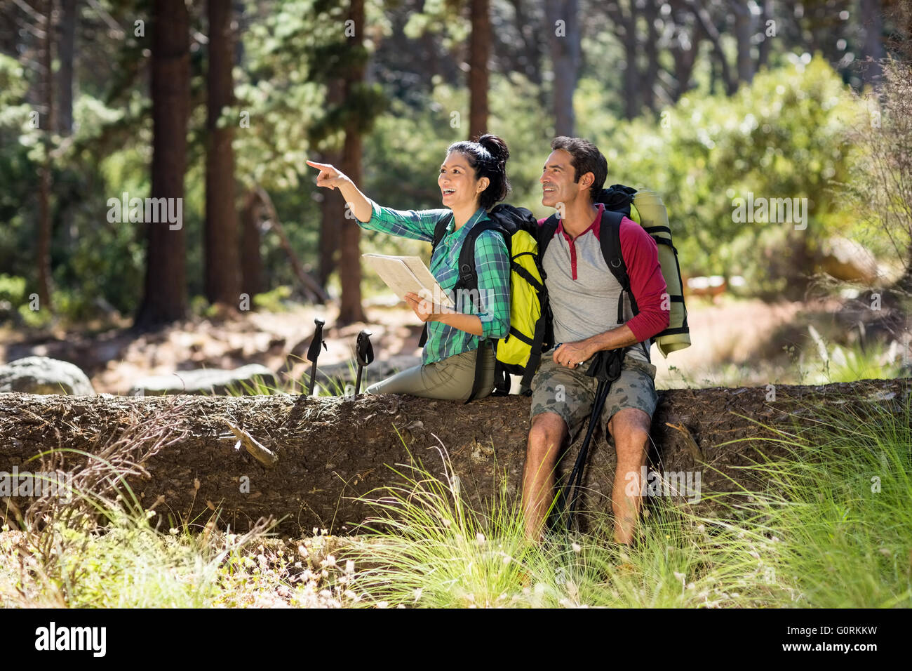 Couple tree sitting hi-res stock photography and images - Alamy