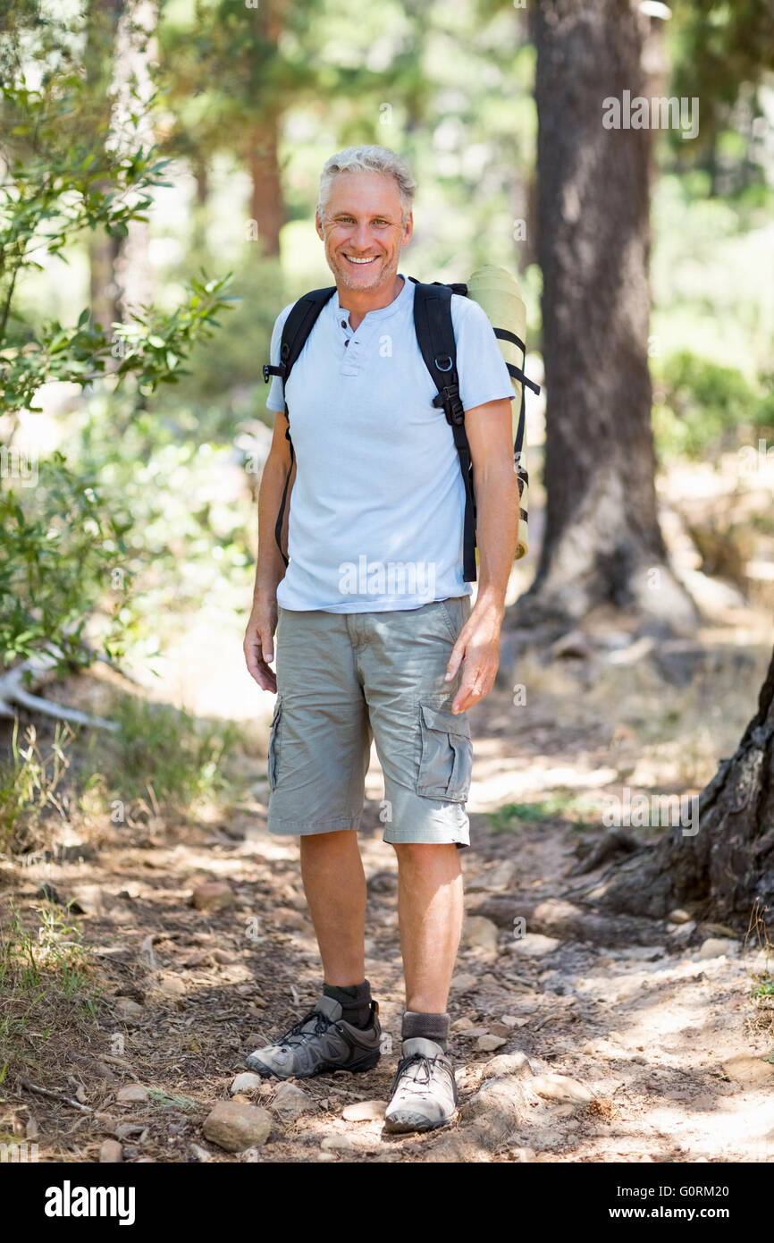 Hiker smiling and posing Stock Photo - Alamy