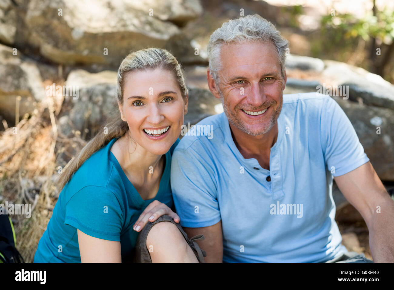 Posing couple sit together hi-res stock photography and images - Alamy