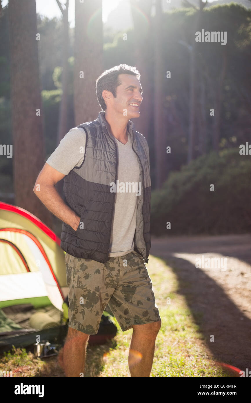 Man smiling and standing Stock Photo - Alamy