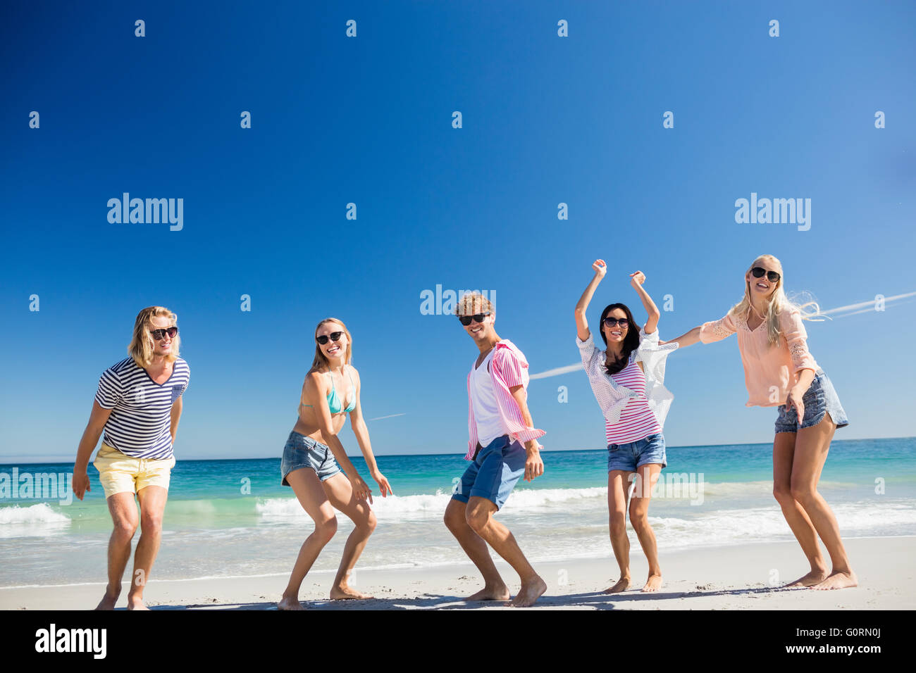 Pretty female friends posing outdoors hi-res stock photography and ...