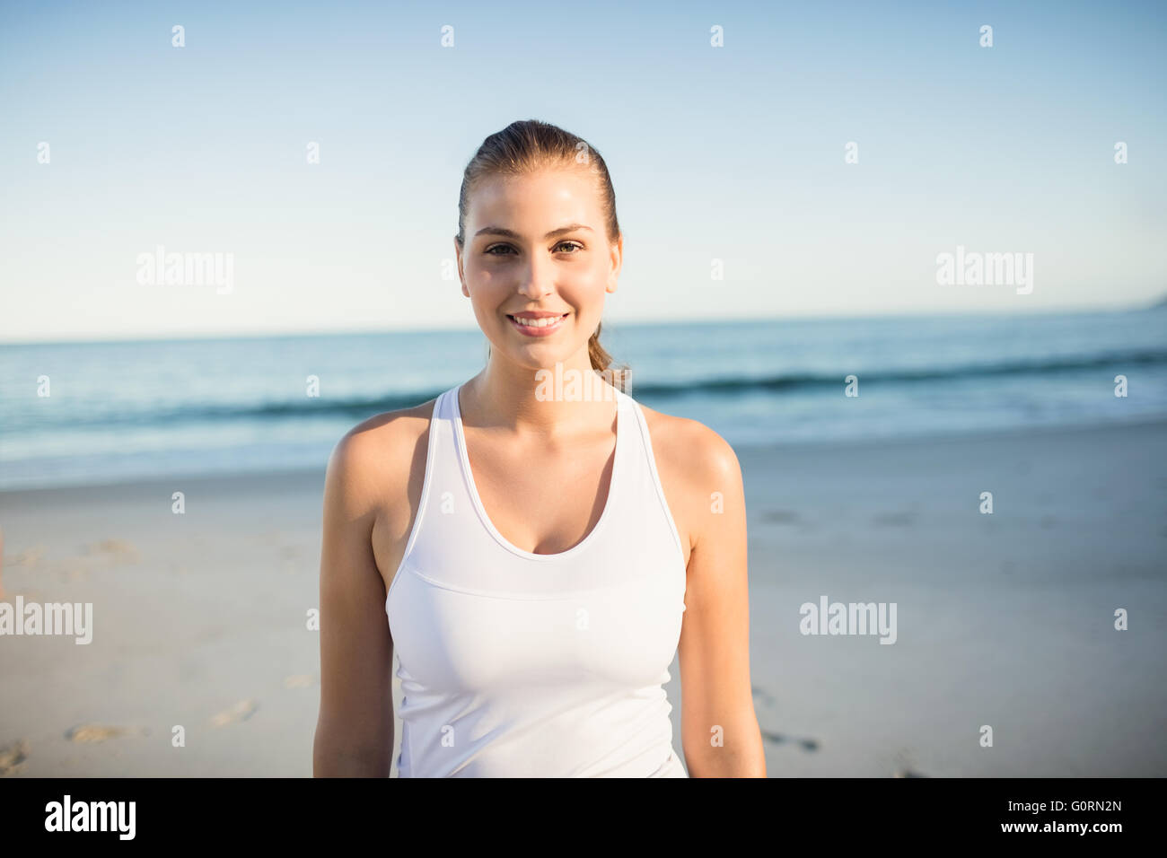 Fit woman on the beach Stock Photo - Alamy