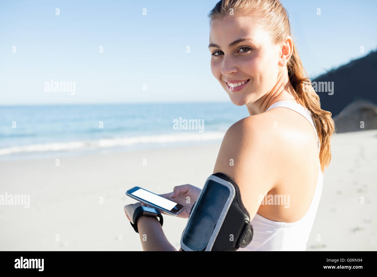 Fit woman on the beach Stock Photo - Alamy