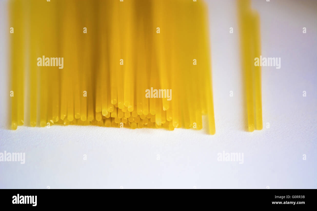 detail of raw spaghetti ready to be cooked Stock Photo - Alamy