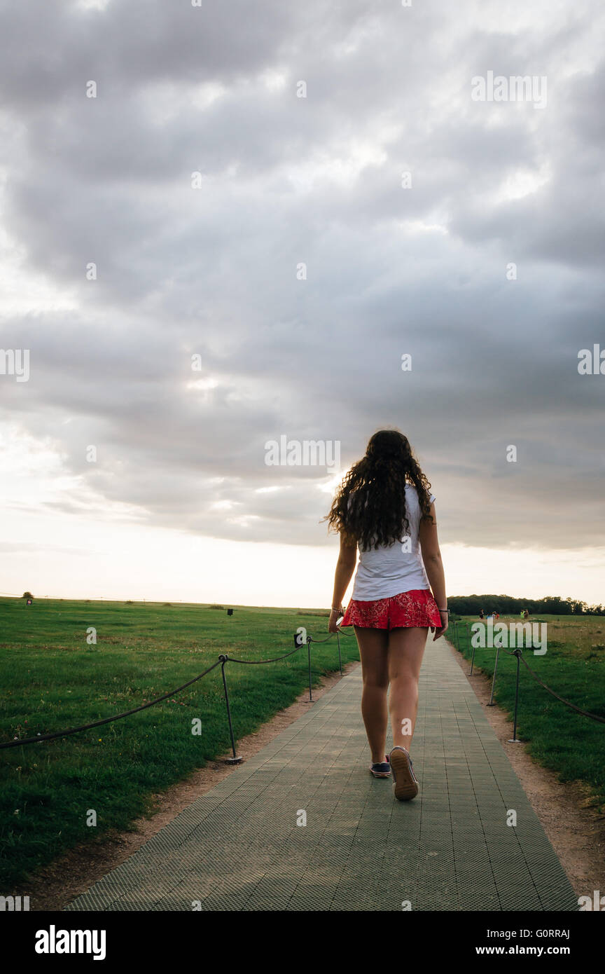Woman walking skirt back view hi-res stock photography and images - Alamy