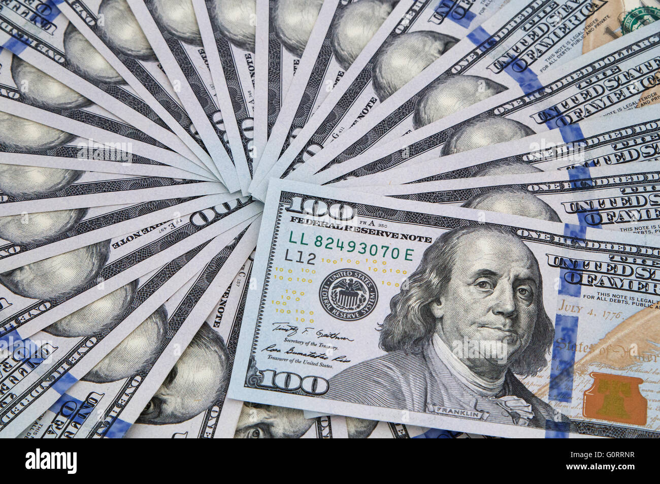close up of fan shaped dollars Stock Photo - Alamy