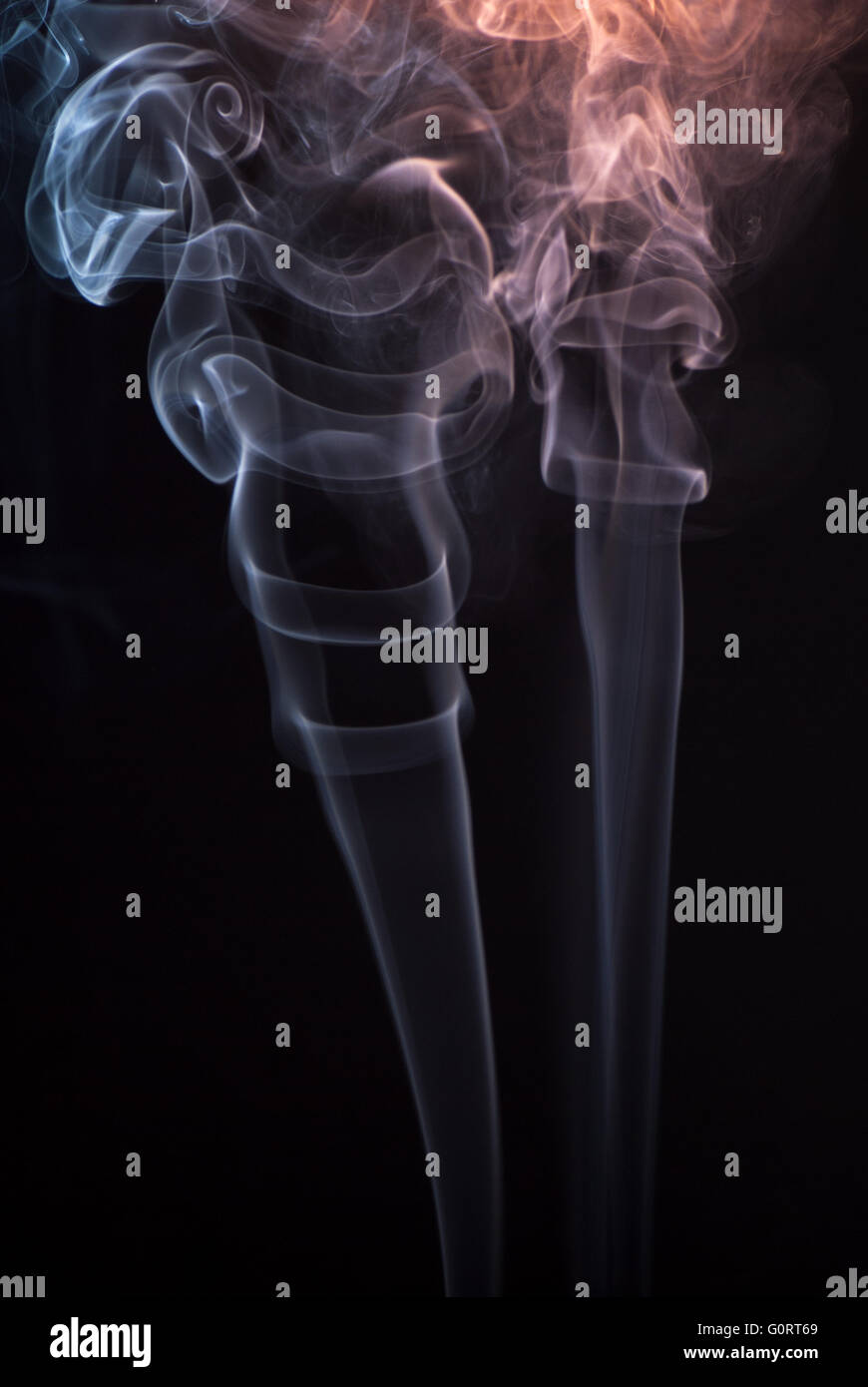 Beautiful smoke on the black background - macro photo Stock Photo - Alamy