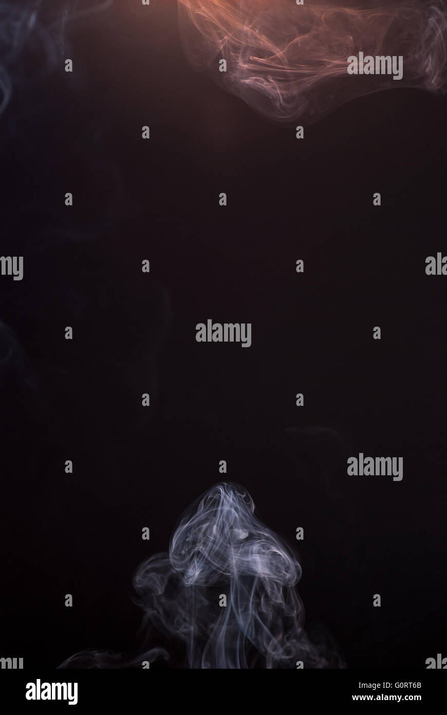 Beautiful smoke on the black background - macro photo Stock Photo - Alamy