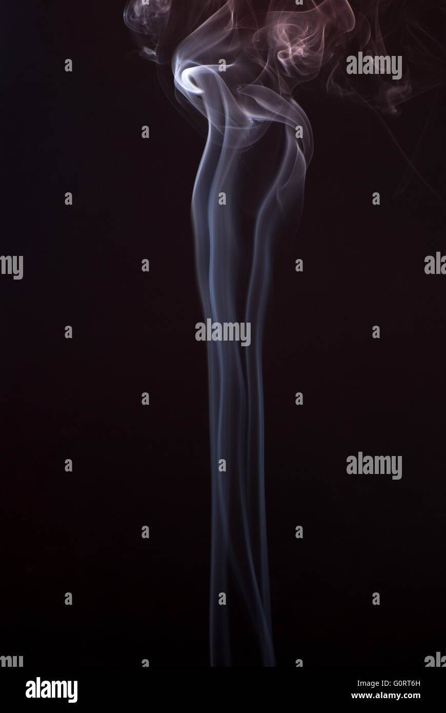 Beautiful smoke on the black background - macro photo Stock Photo - Alamy