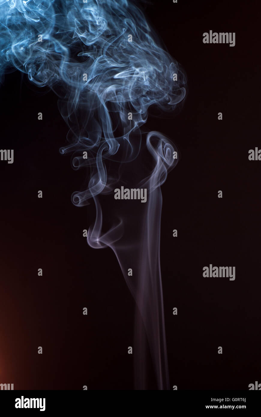 Beautiful smoke on the black background - macro photo Stock Photo - Alamy