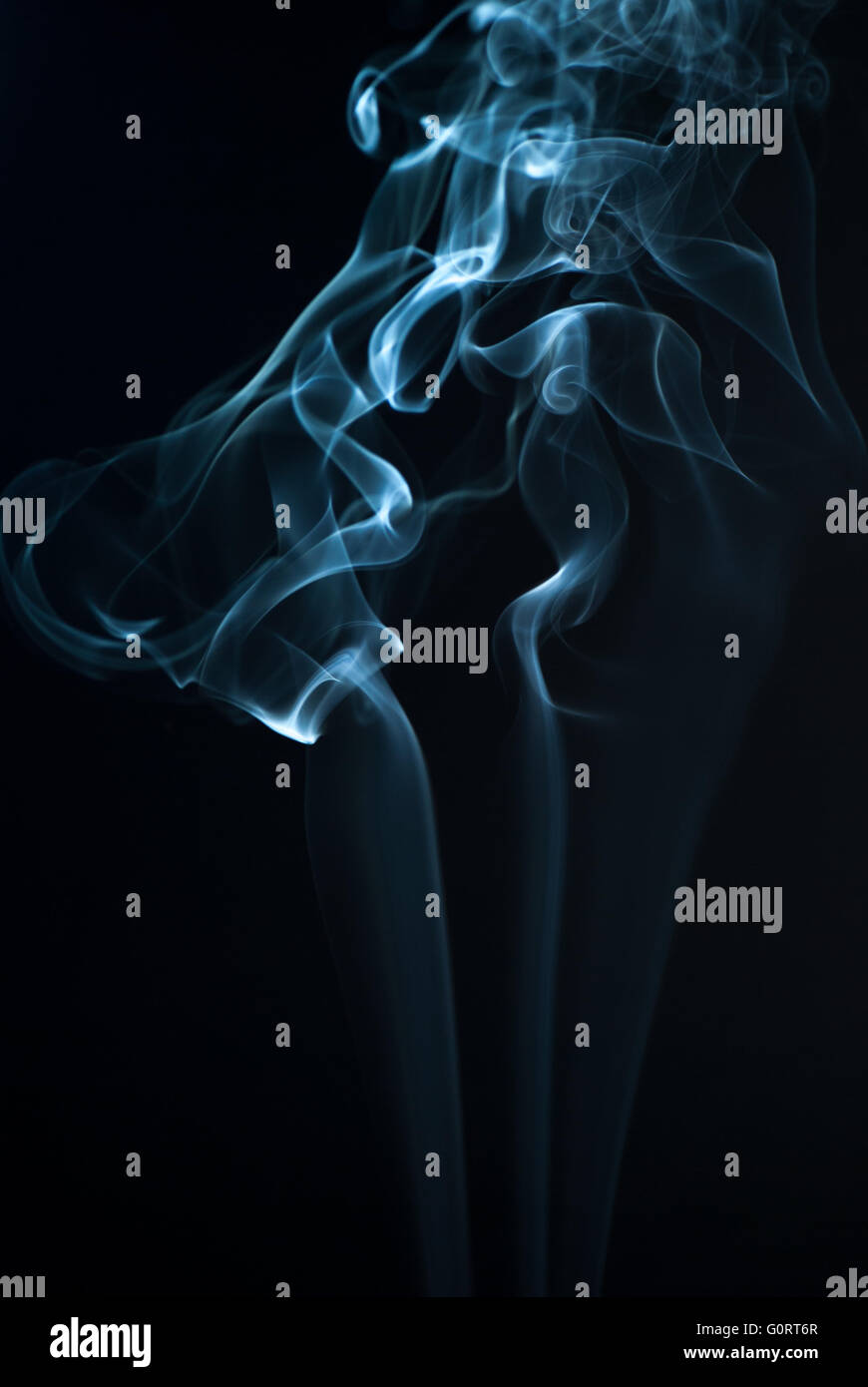 Beautiful smoke on the black background - macro photo Stock Photo - Alamy