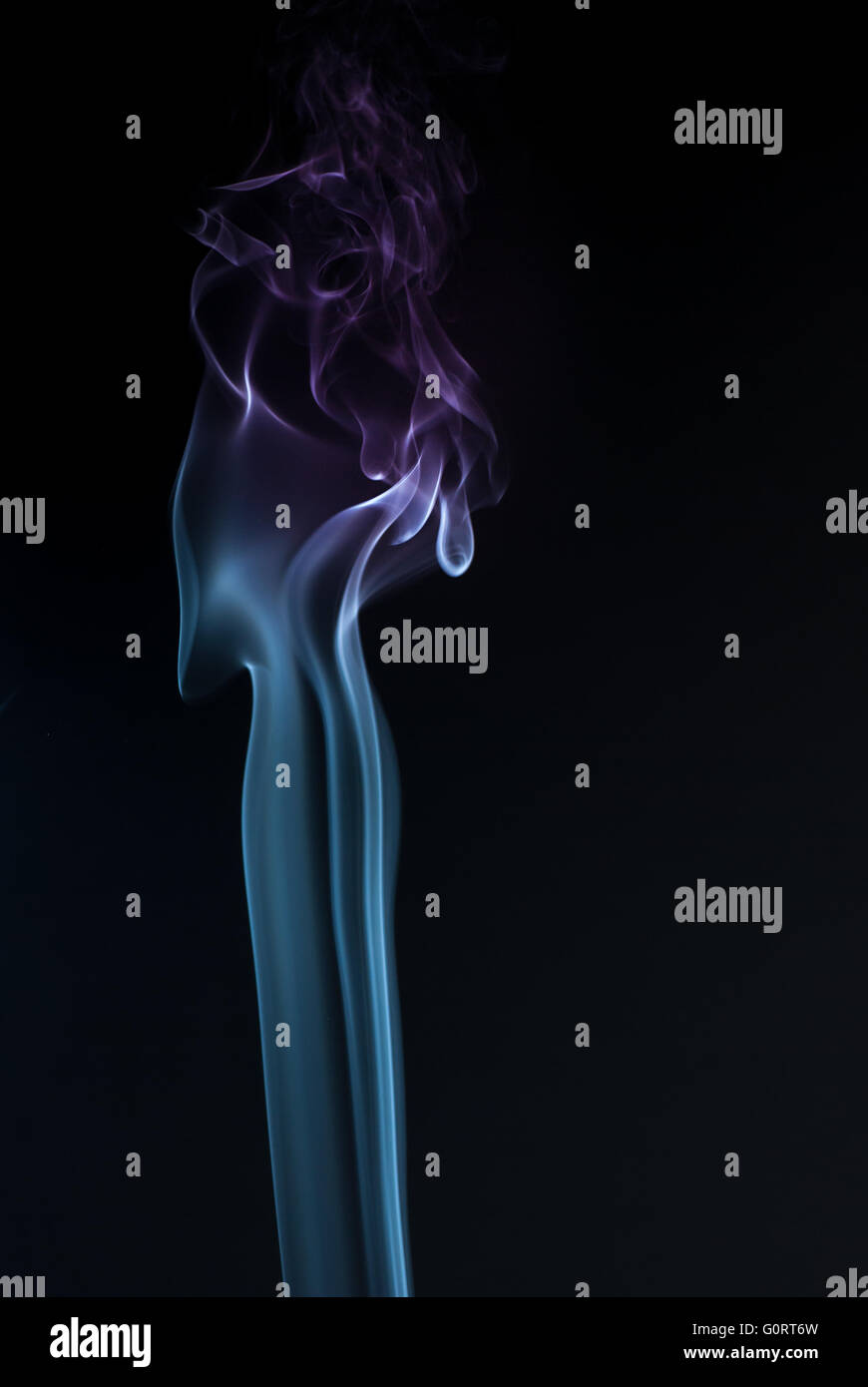 Beautiful smoke on the black background - macro photo Stock Photo - Alamy