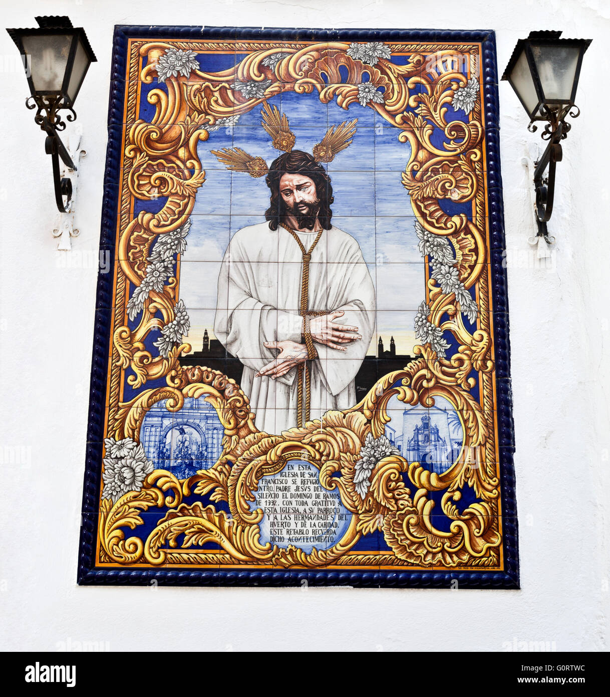 An azulejo (tiles) ceramic panel depicting Jesus Christ on a wall in ...