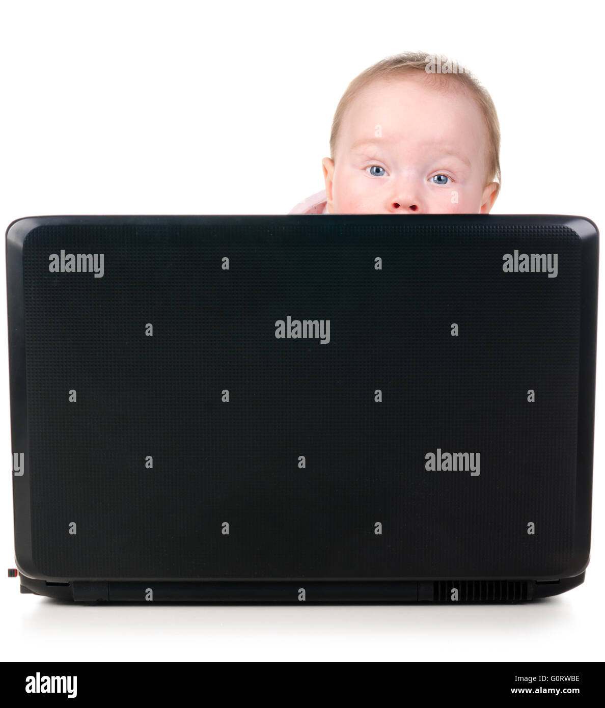 little baby is working on laptop Stock Photo - Alamy