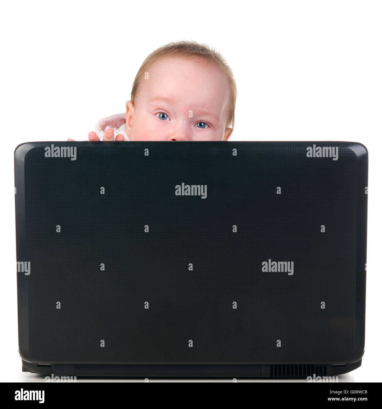 baby is working on laptop Stock Photo - Alamy