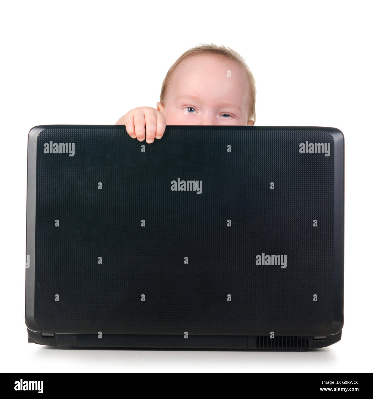 baby is working on laptop Stock Photo - Alamy