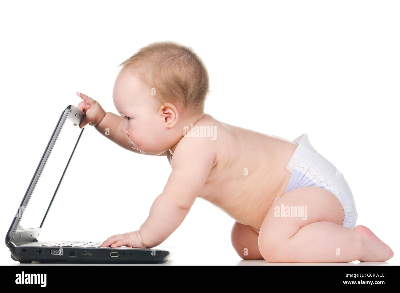 baby is working on laptop Stock Photo - Alamy