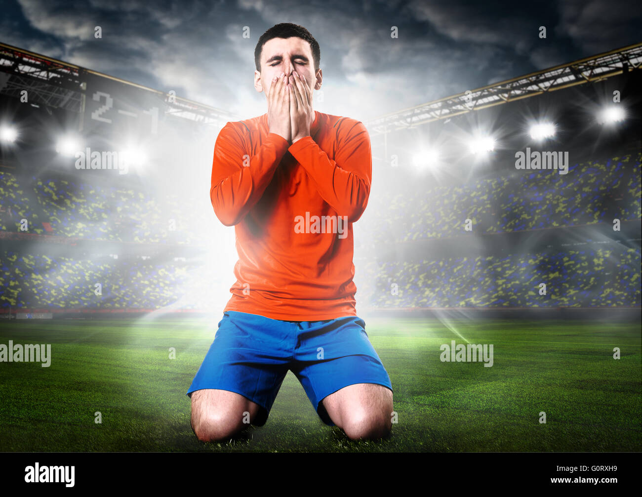 sad soccer player Stock Photo - Alamy