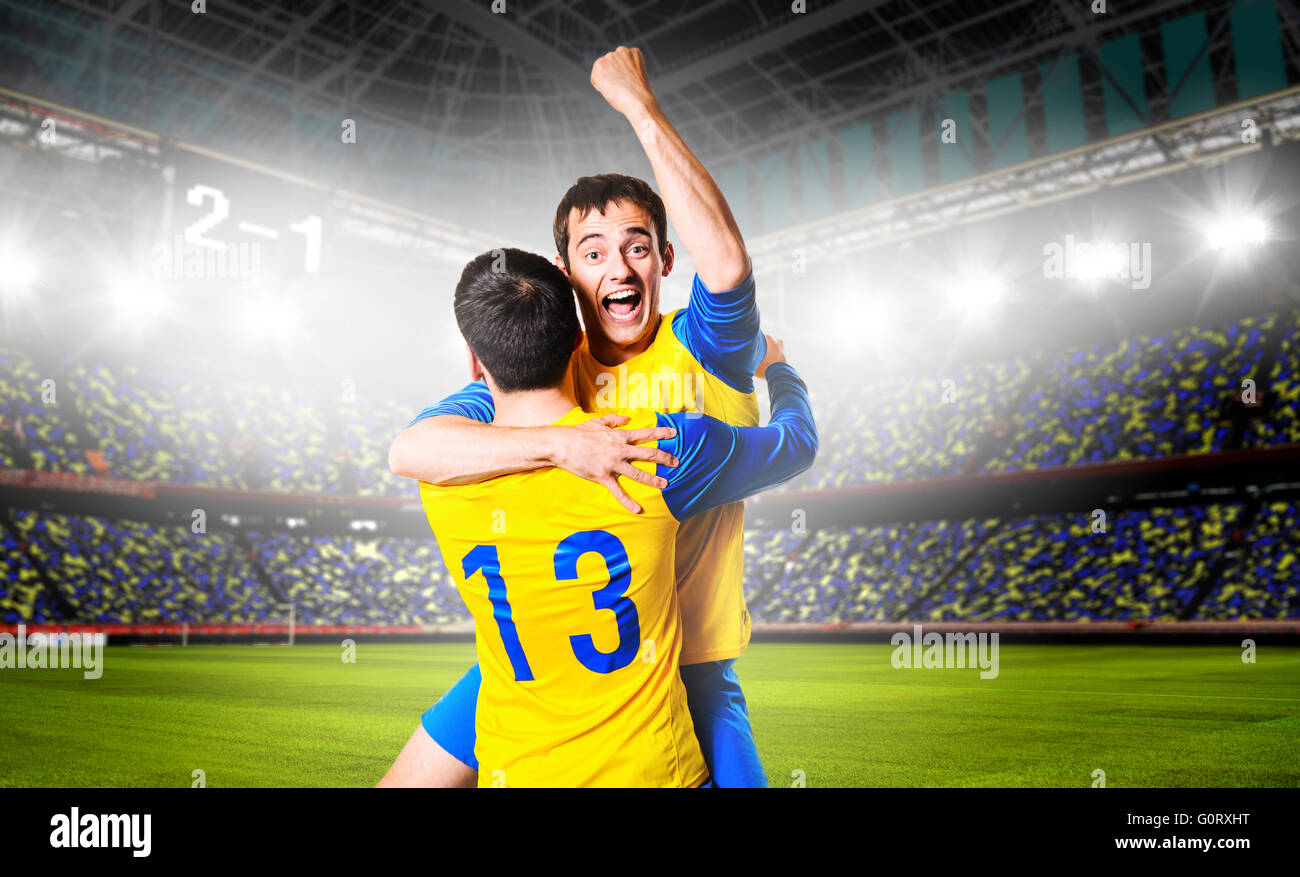 Celebrating players yellow white hi-res stock photography and images ...