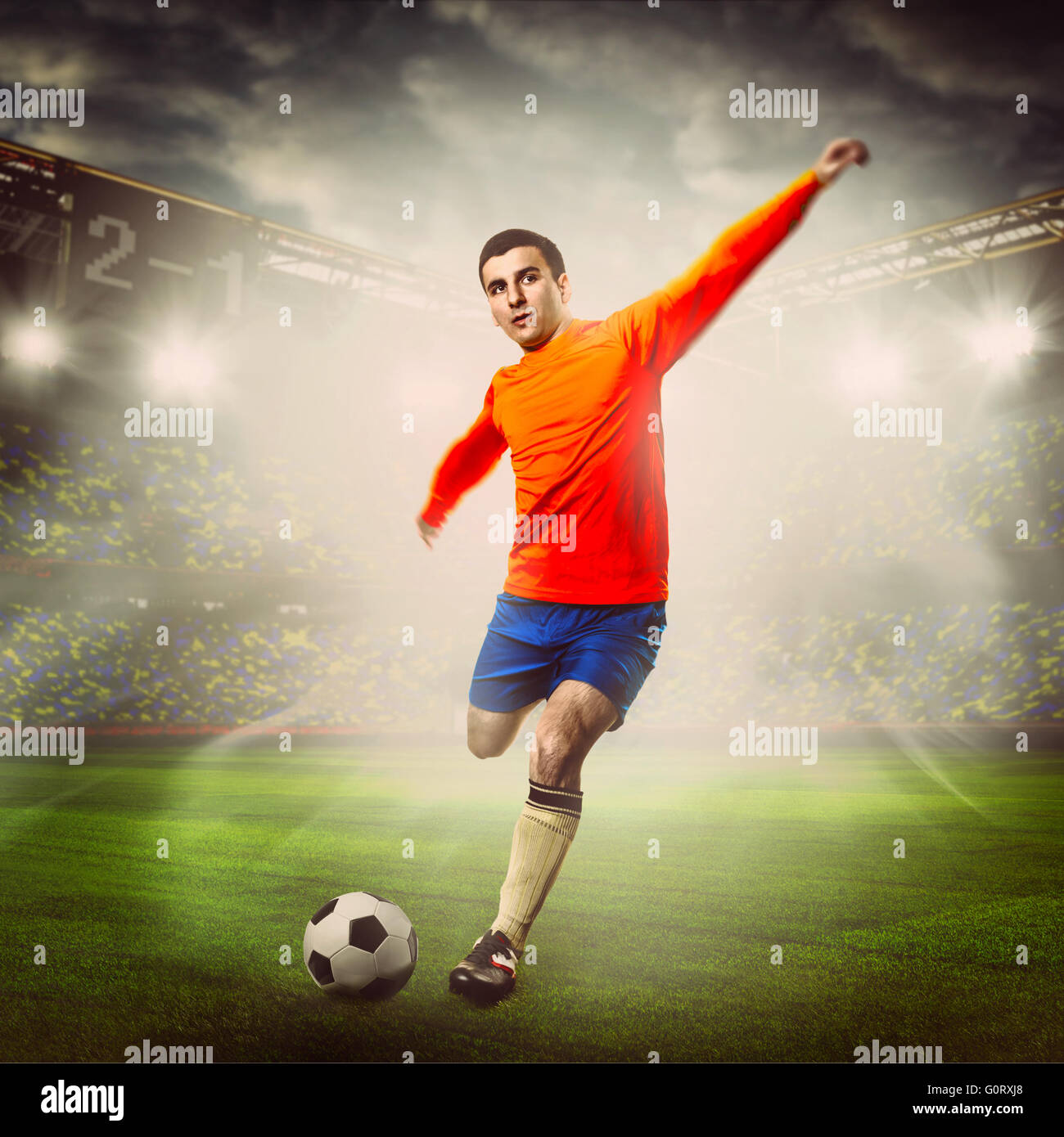 Feet of red team soccer player hi-res stock photography and images - Alamy