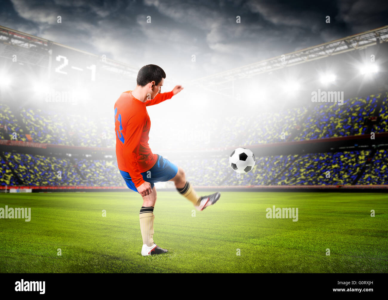 Feet of red team soccer player hi-res stock photography and images - Alamy