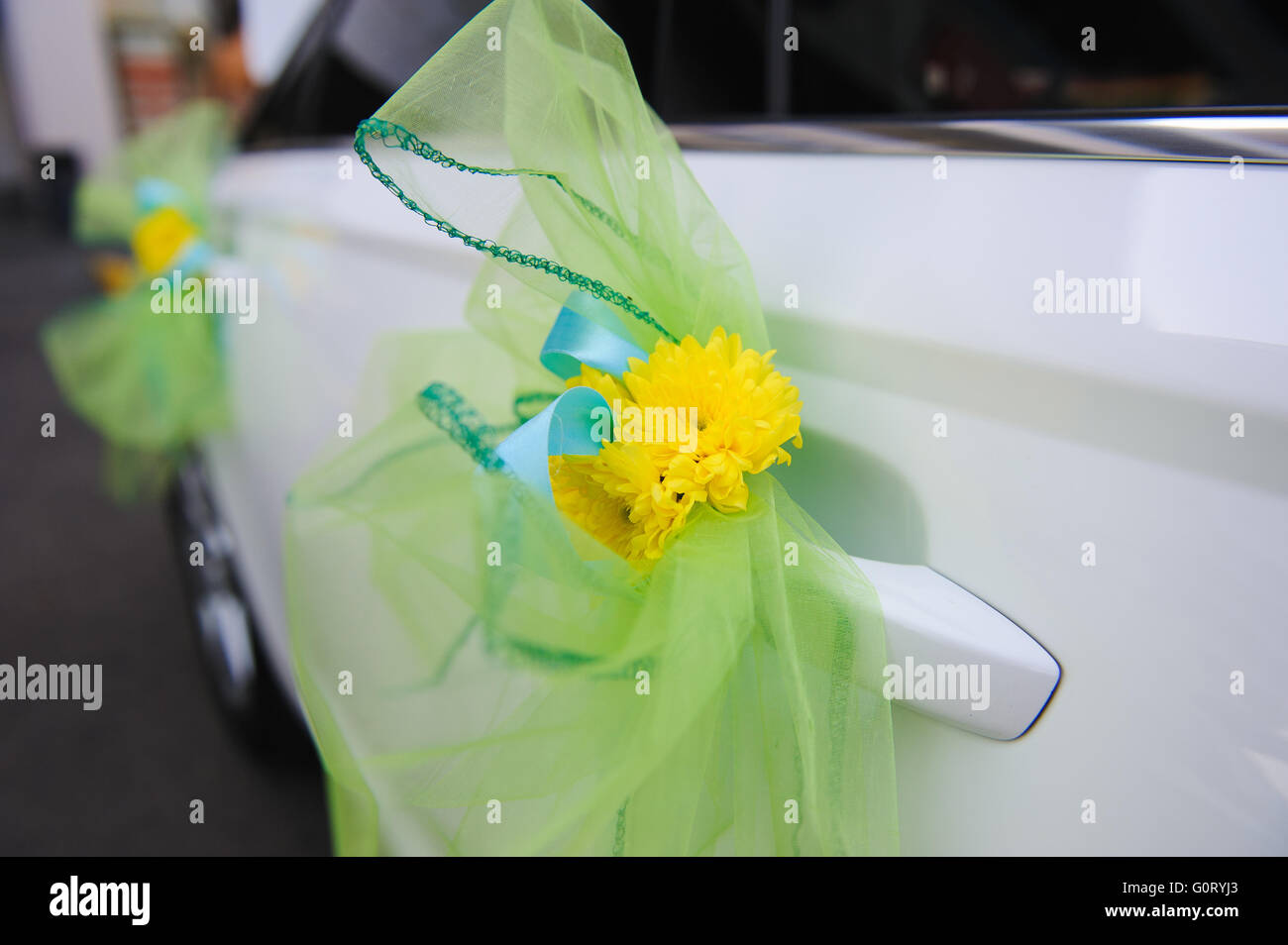 Wedding decor on the car handle Stock Photo - Alamy