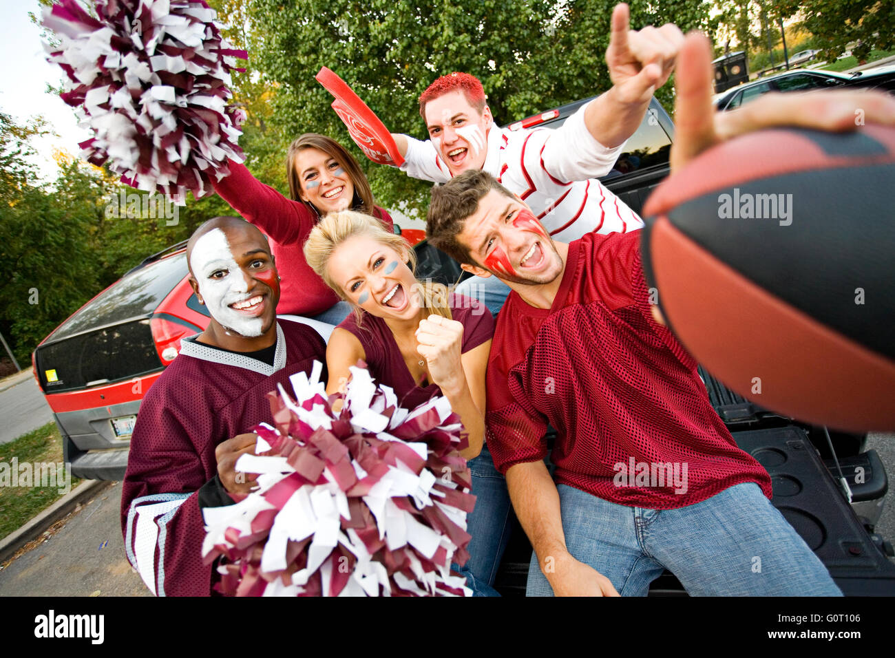 Series with college football fans tailgating and having fun before the ...