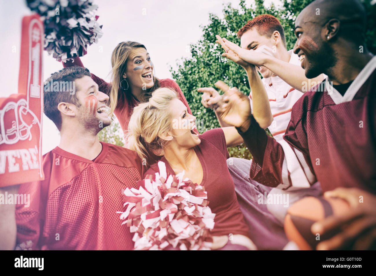 Series with college football fans tailgating and having fun before the ...